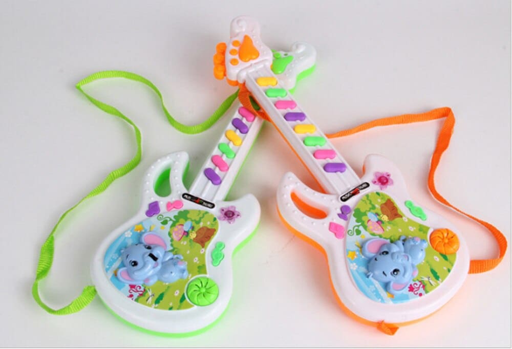 Elgitarr med tecknade motiv för barn • Barn World